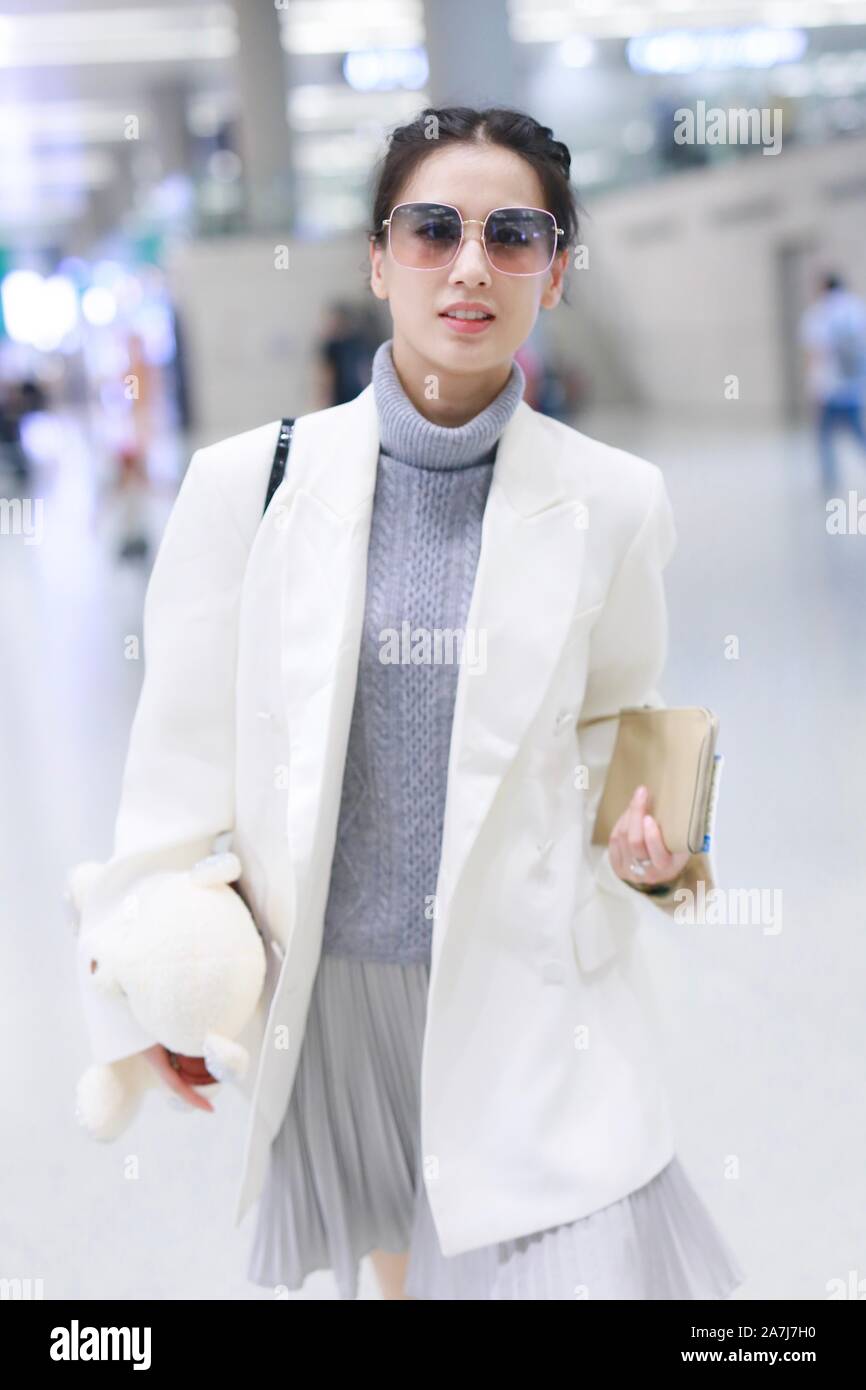 Chinese actress and singer Eva Huang Shengyi arrives at the Shanghai ...