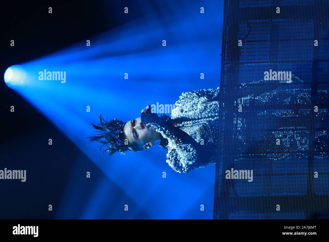 Hong Kong singer-songwriter and actor Kenny Kwan sings at his concert ...