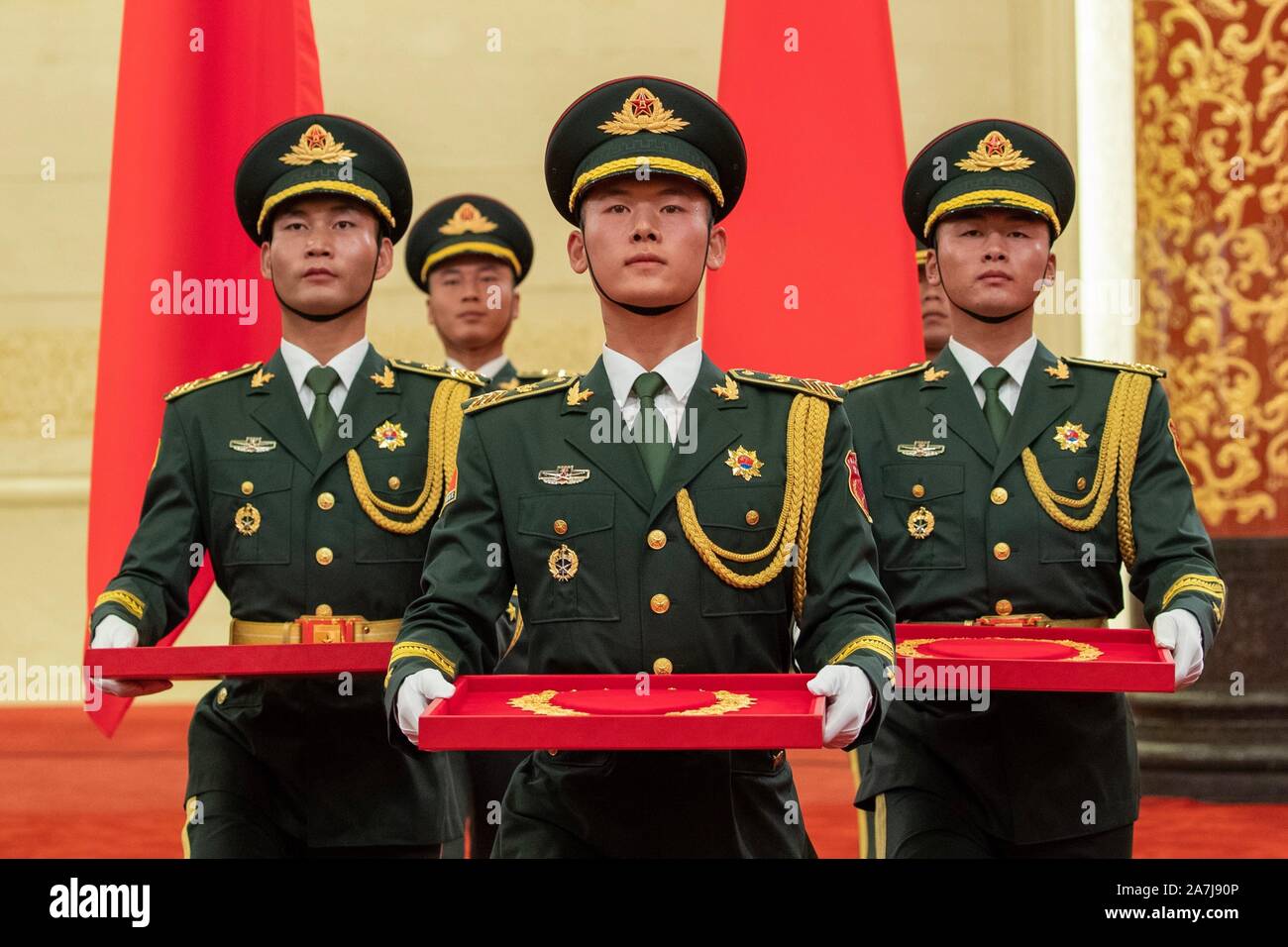 Soldiers present medals at the presentation ceremony of the national ...