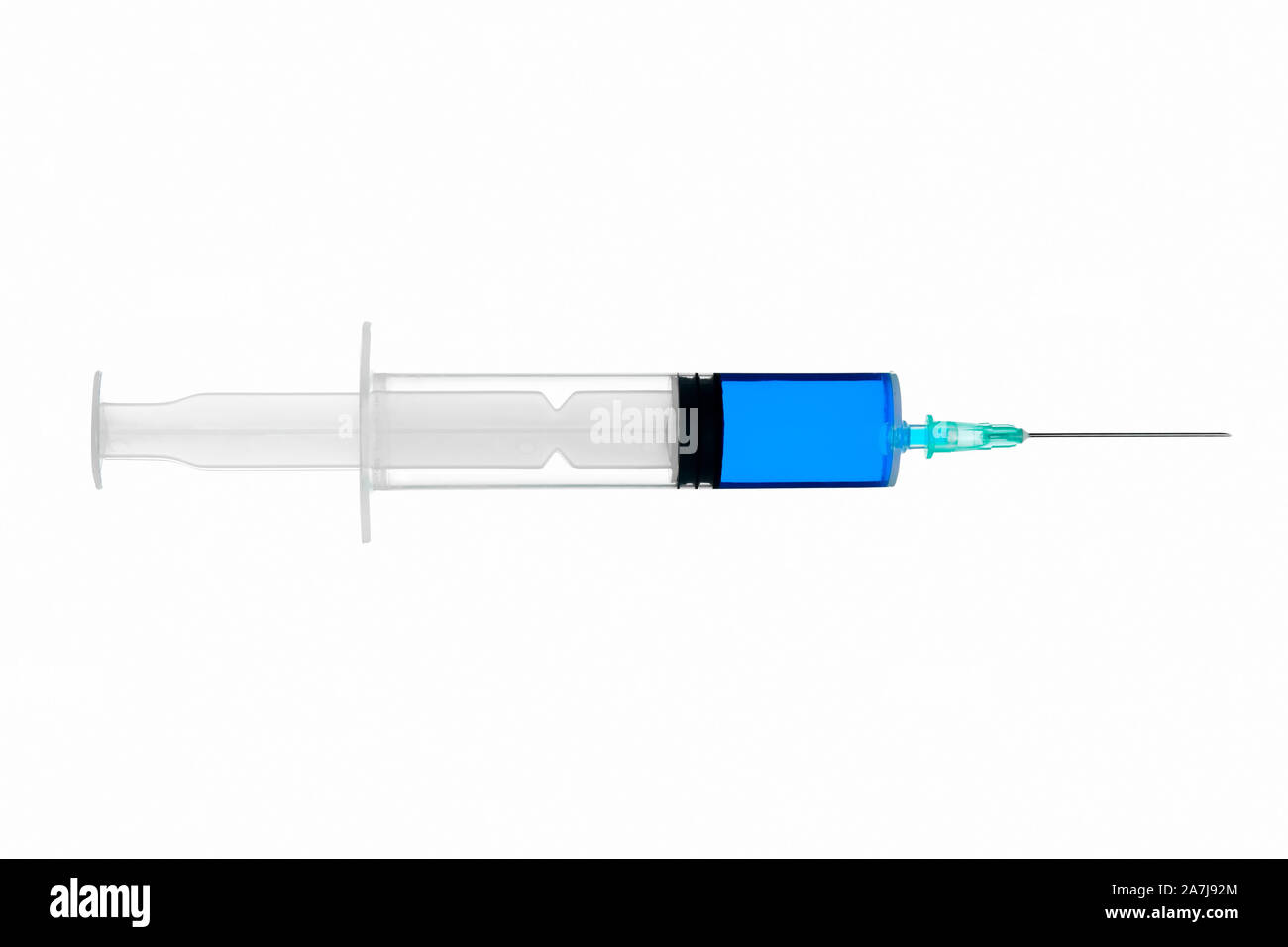 Big syringe filled with blue liquid on isolated white background Stock ...