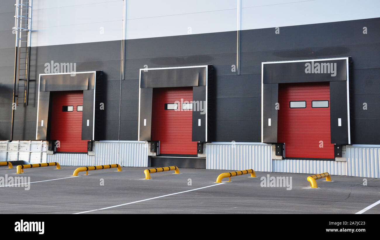 Empty loading dock of a large warehouse. Modern warehouse complex ...