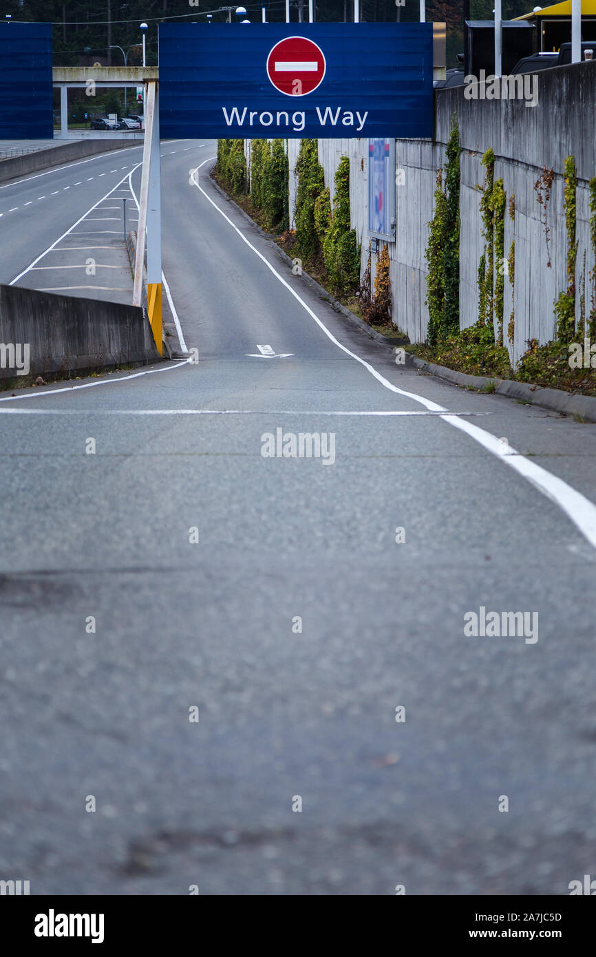 A highway road sign that says wrong way Stock Photo - Alamy