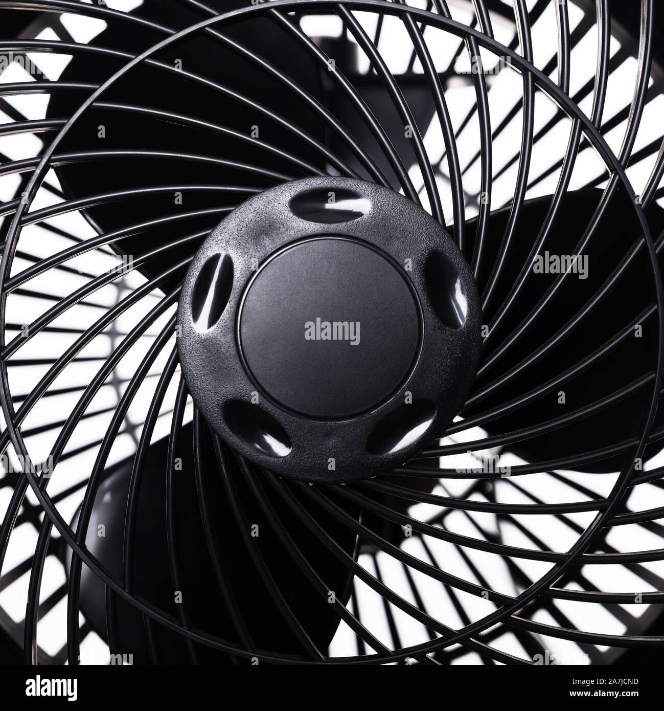 closeup of an black, electric fan in front of a white background Stock ...
