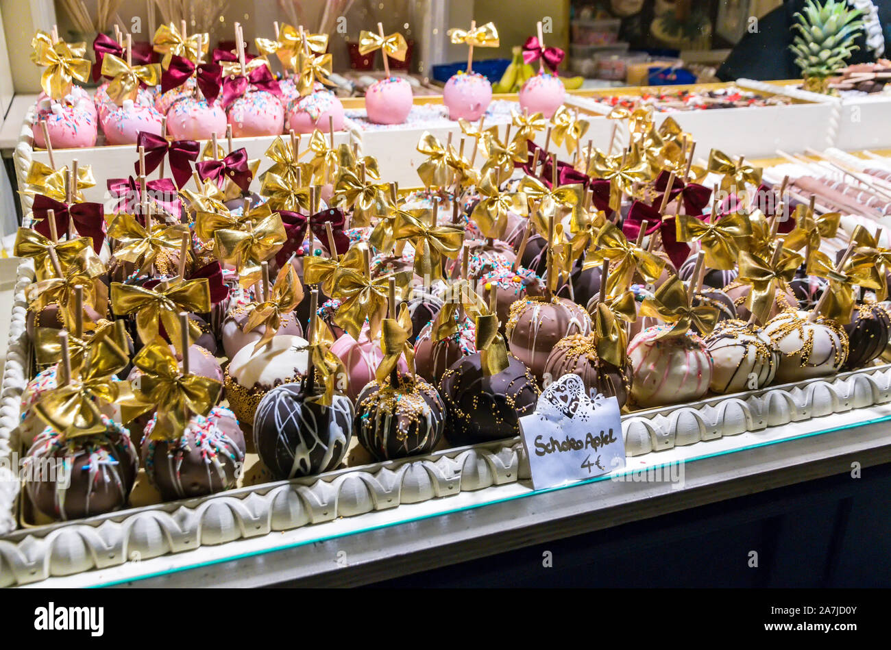 Hamburg, Germany - December 14, 2018: Kiosk on Christmas market with traditional candies Schoko ...