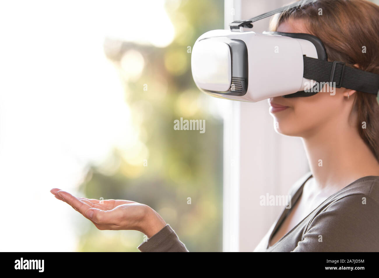 Young woman in vr glasses hi-res stock photography and images - Alamy
