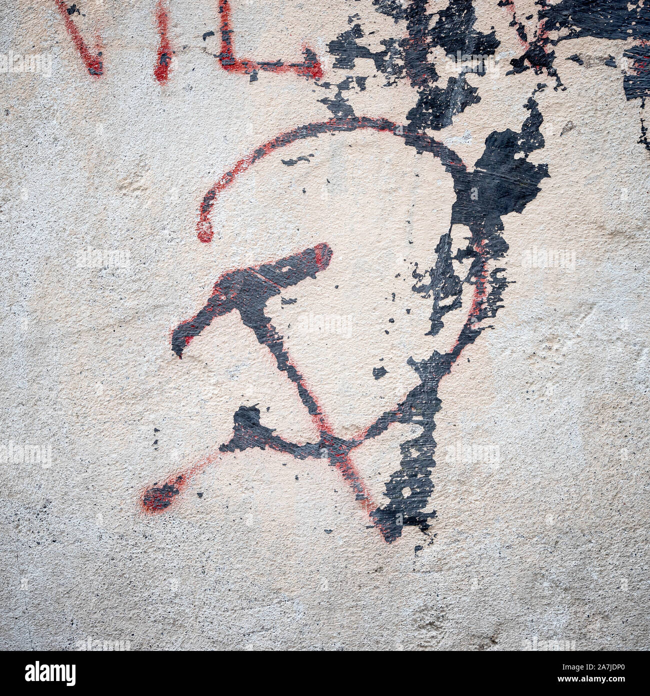 Old grungy communism symbol graffiti on a wall, red color Stock Photo ...