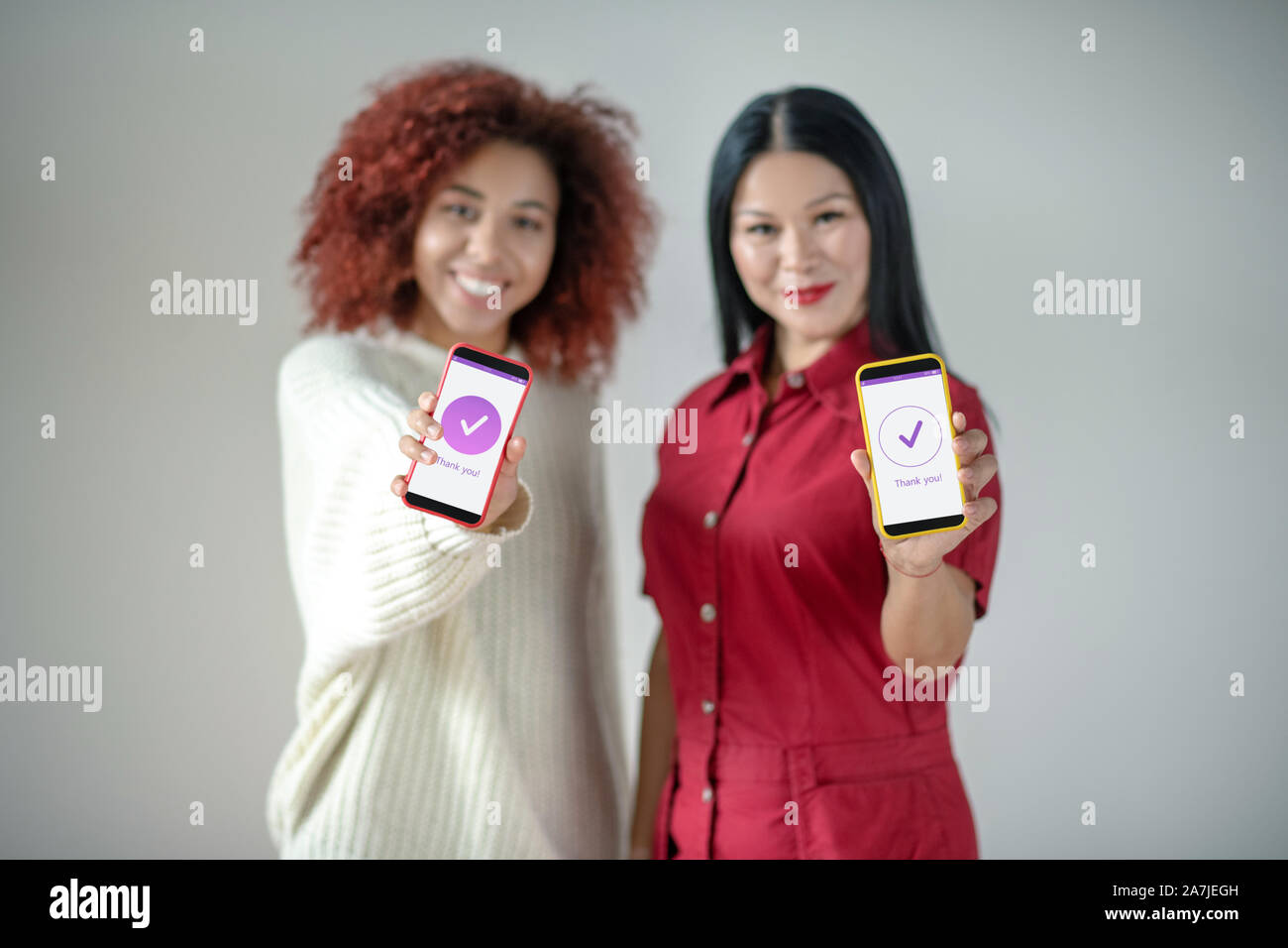 Two best friends using their hi-res stock photography and images - Alamy