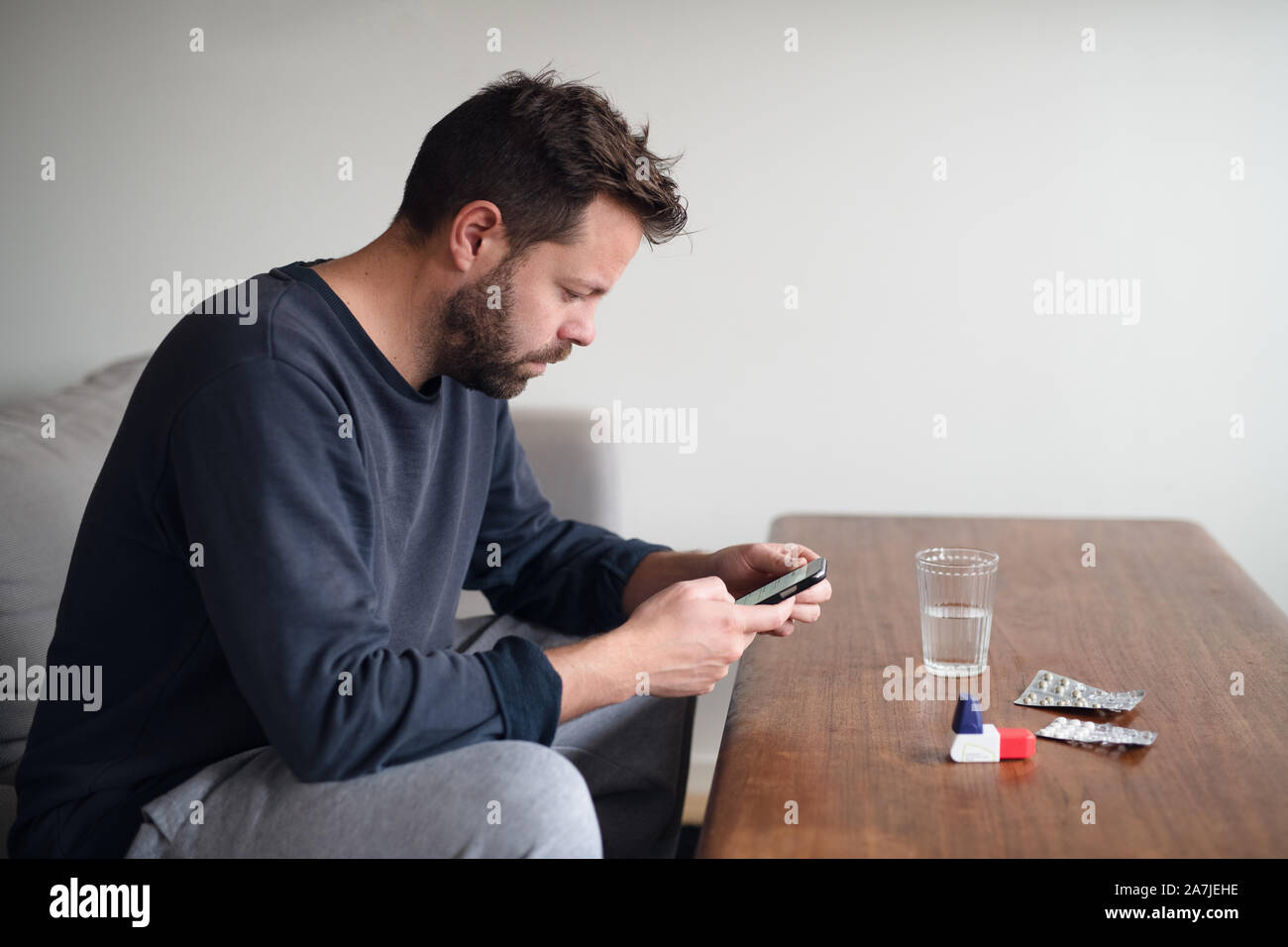 Man using cell phone after hi-res stock photography and images - Alamy