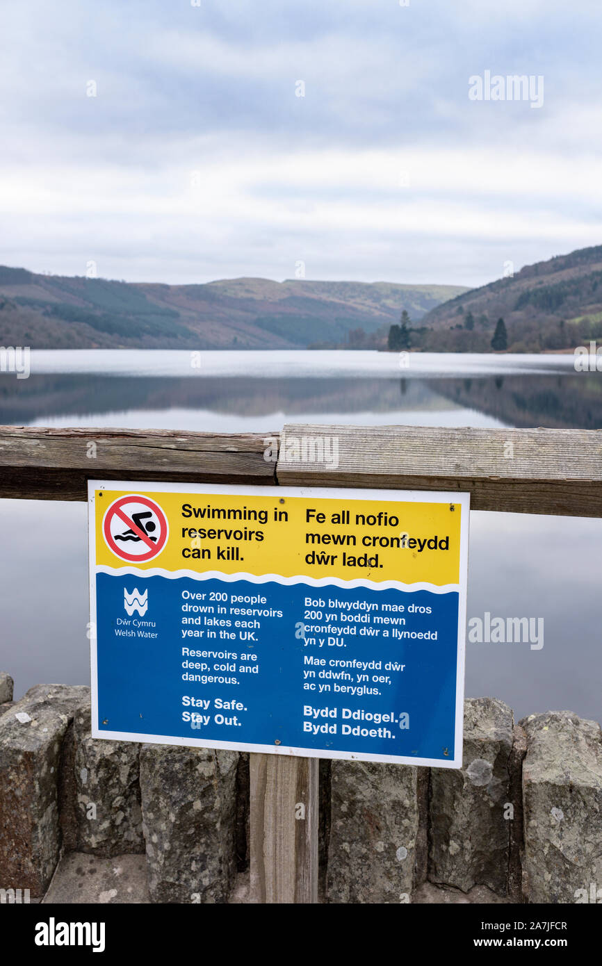 Warning sign on Talybont reservoir dam. Swimming in reservoirs can kill ...
