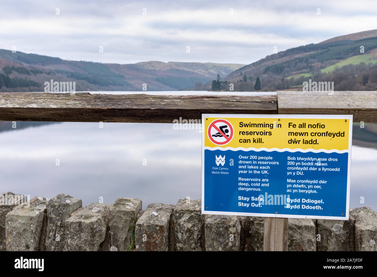 Warning sign on Talybont reservoir dam. Swimming in reservoirs can kill ...