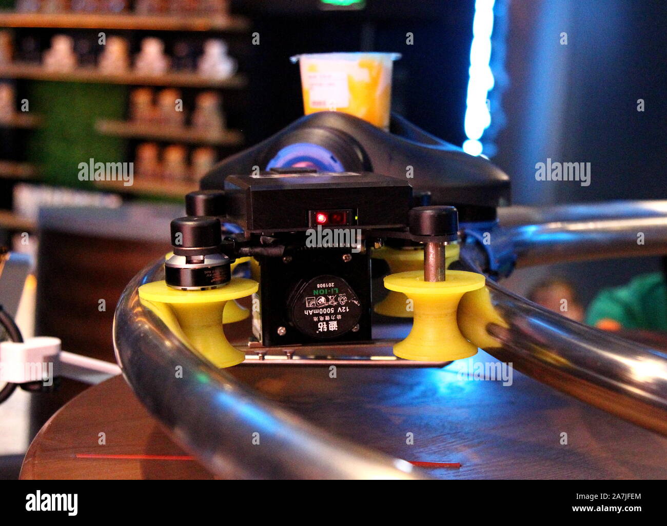 The gravity sled delivers drinks in SpaceLab, a space-themed restaurant ...