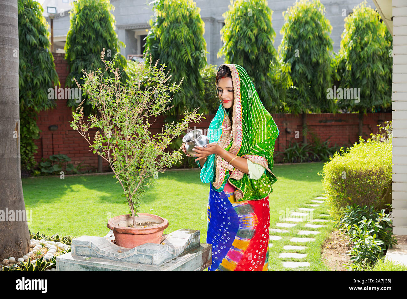 Indian woman performing pooja hi-res stock photography and images - Alamy