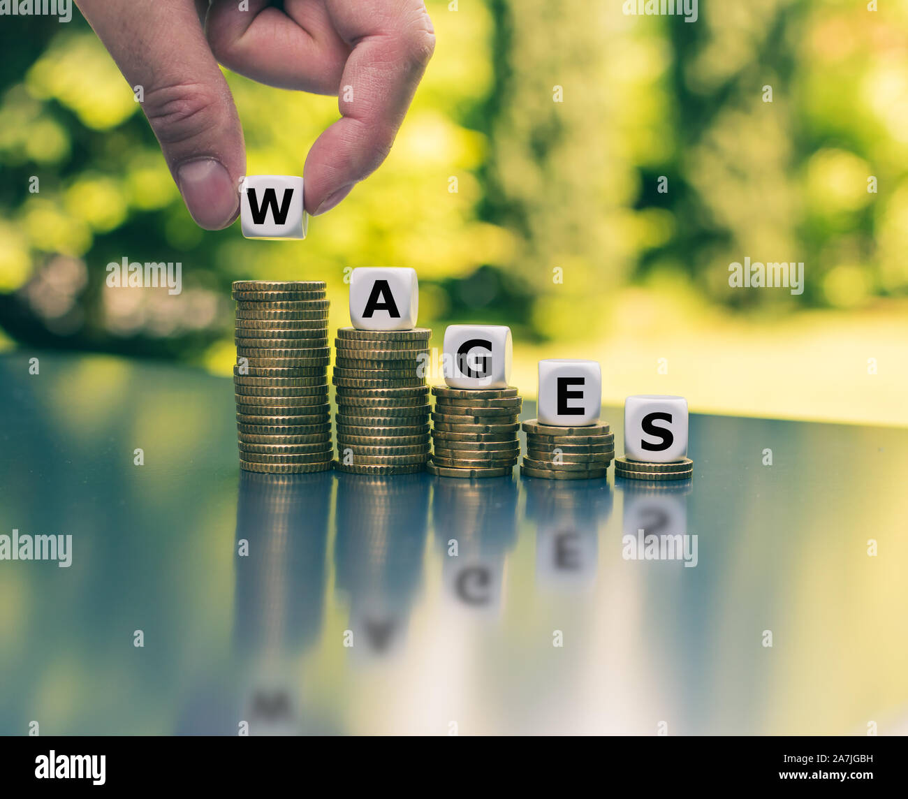 Concept of wages going down Stock Photo - Alamy