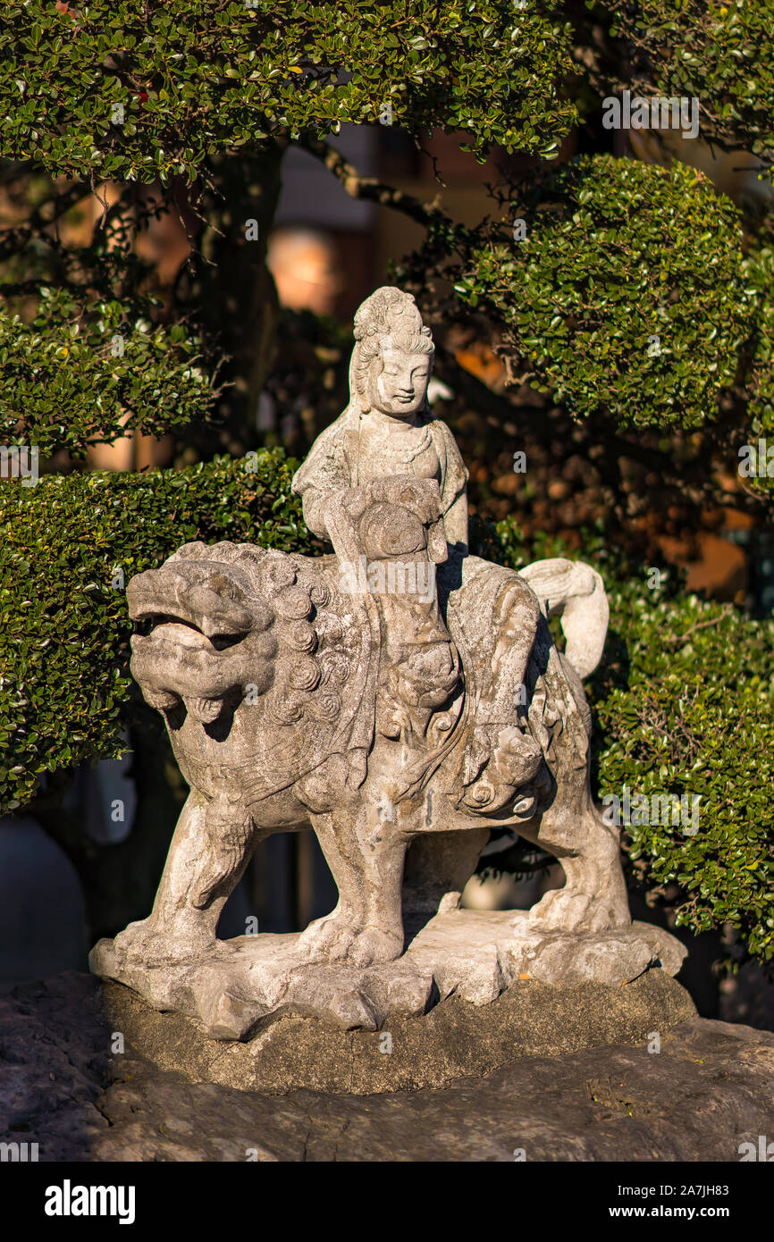 Stone statue of Togakuji temple in Tokyo depicting Japanese bodhisattva ...