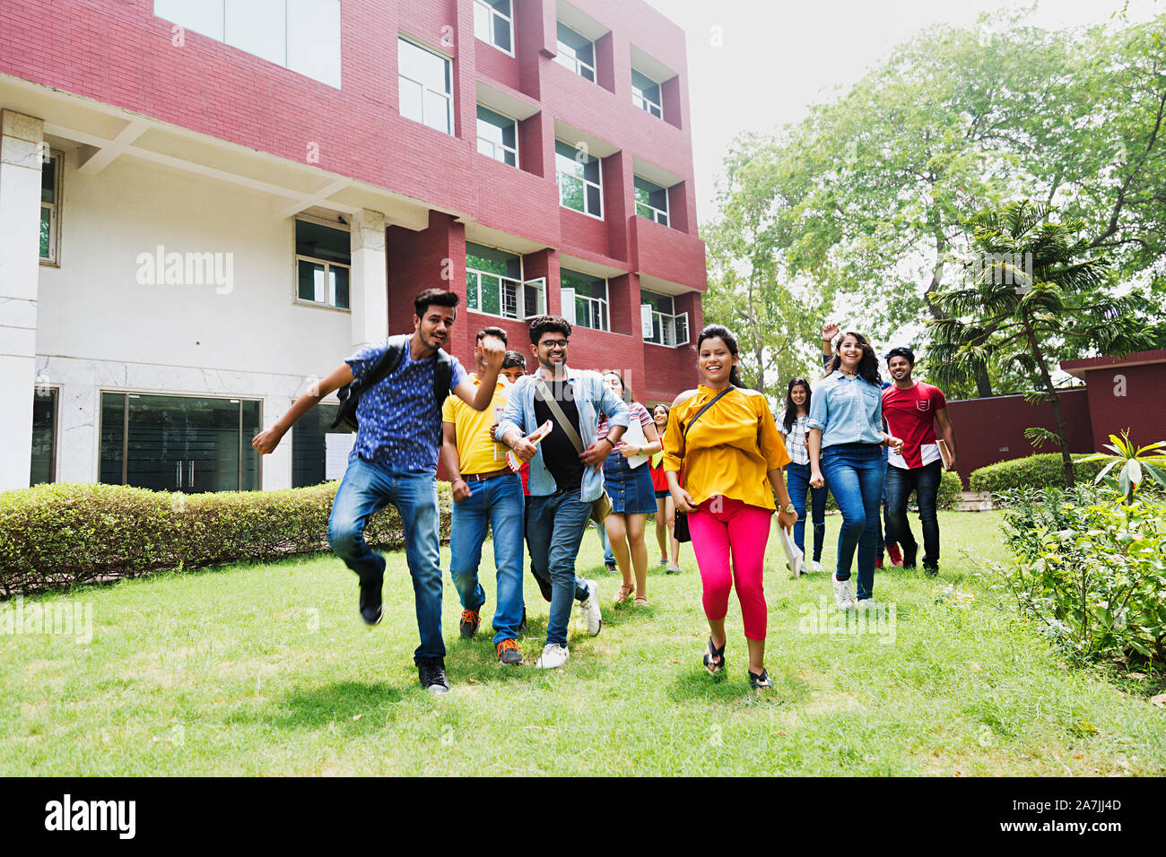Group Of College Students Friends Running Together Success Celebration ...
