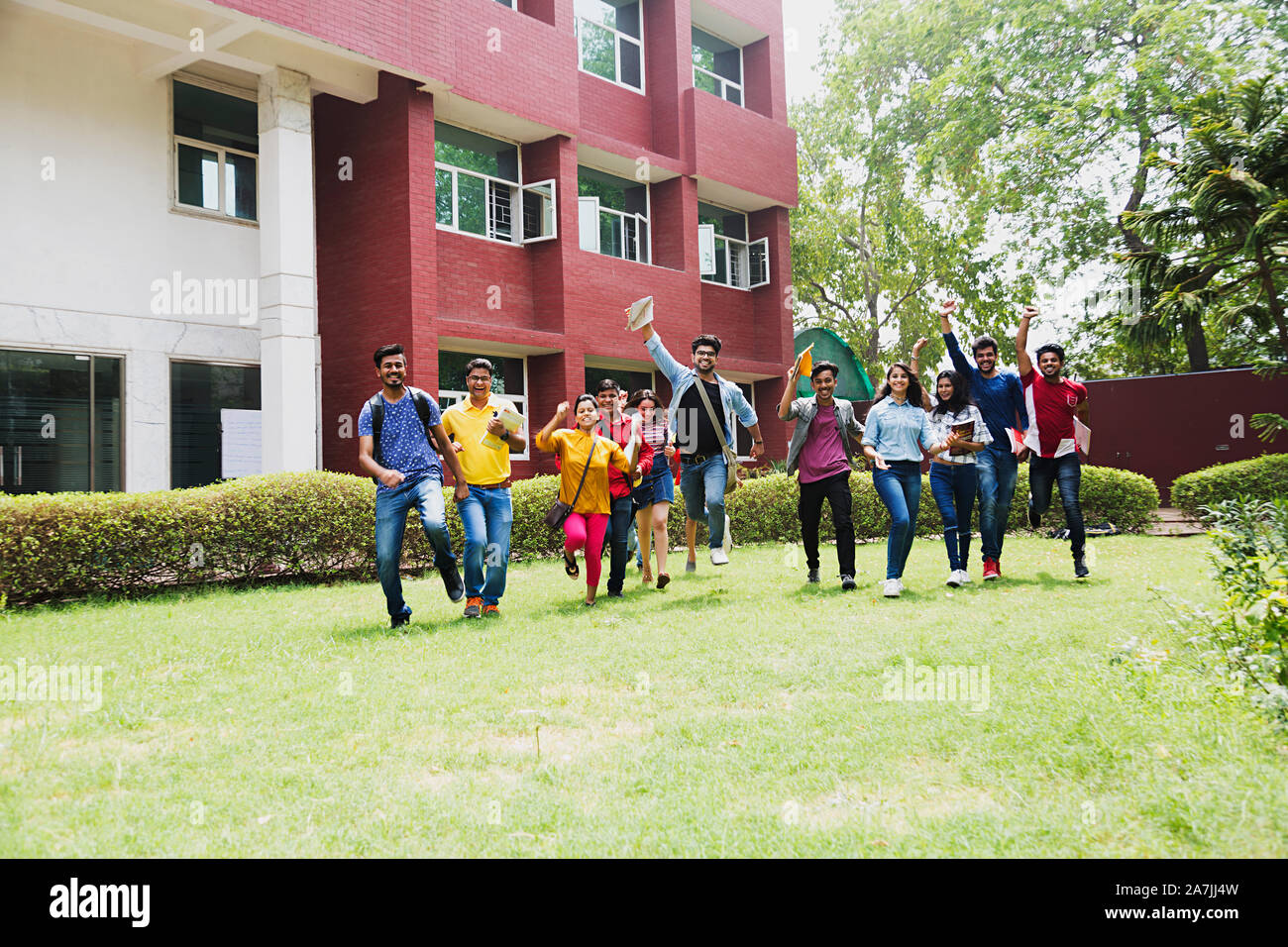 Full-Length of Group College Boys And Girls Students Classmates Running ...