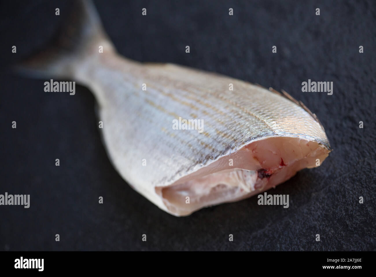 Headless fish hi-res stock photography and images - Alamy