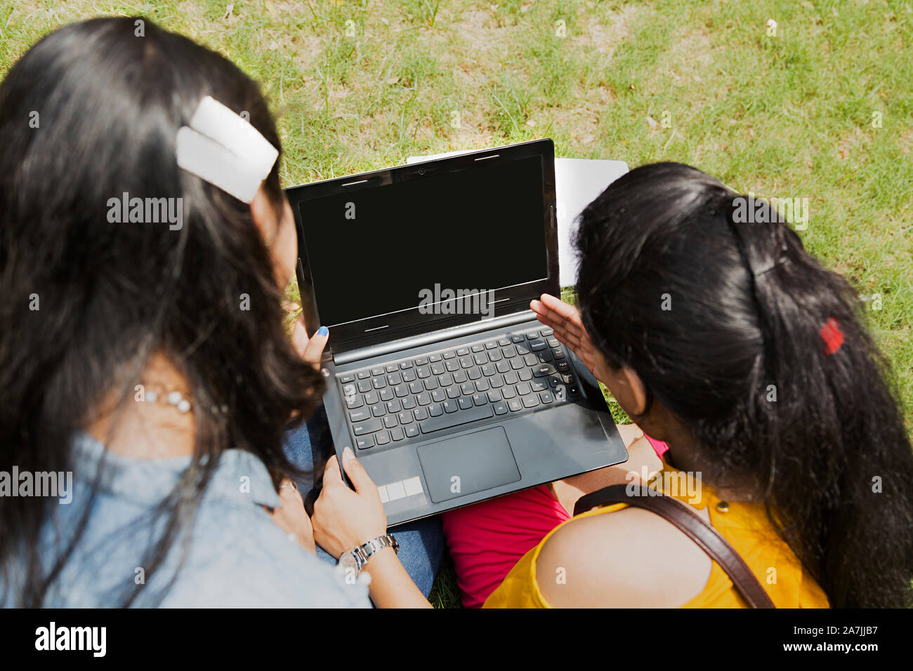Showing on lap top hi-res stock photography and images - Alamy