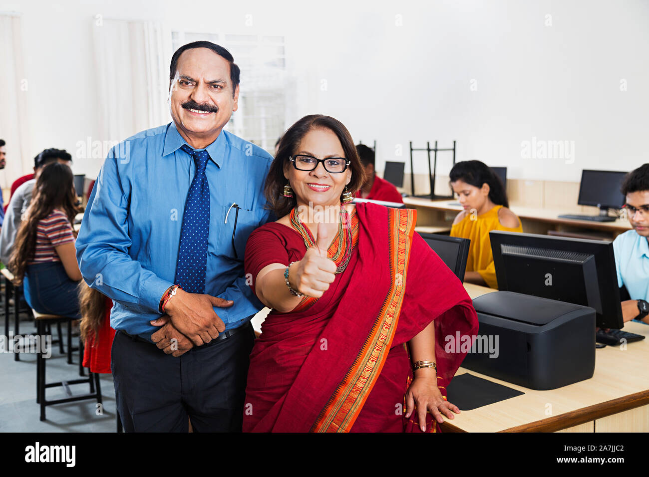 Indian teacher showing thumbs up hi-res stock photography and images ...
