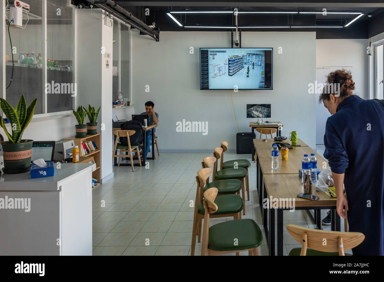 Customers rest in the convenient store in Shanghai, China, 24 September ...