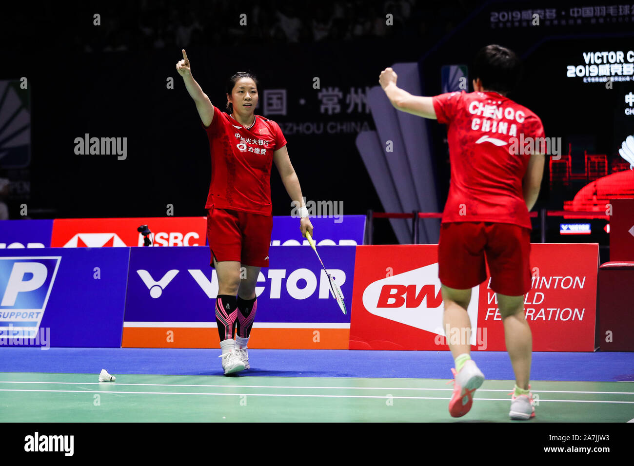 Chinese professional badminton players Jia Yifan and Chen Qingchen compete against Japanese ...