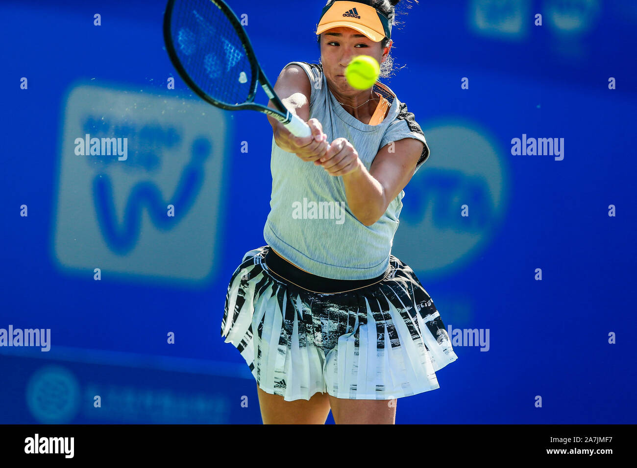 Xinyun Han of China catches the ball against Fiona Ferro of France at ...