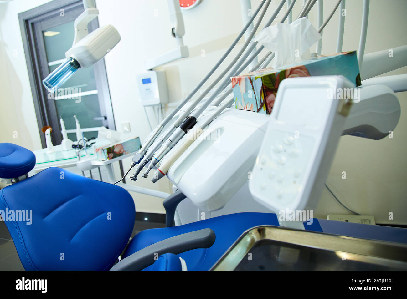 Modern metallic dentist tools and burnishers on a dentist chair in ...