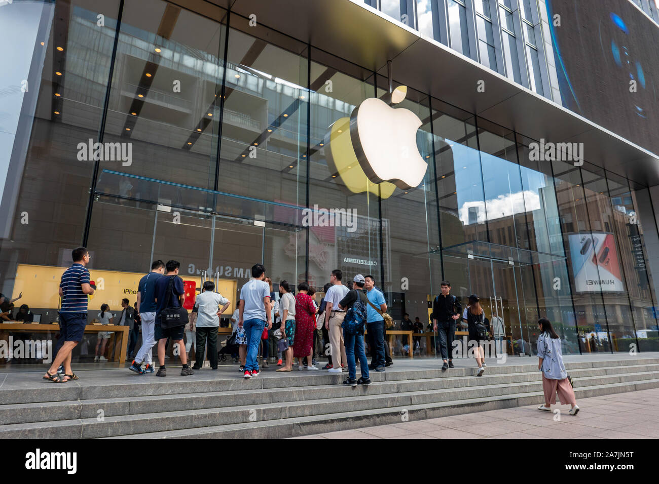 Apple lovers of all ages flock to an Apple Retail Store to experience ...