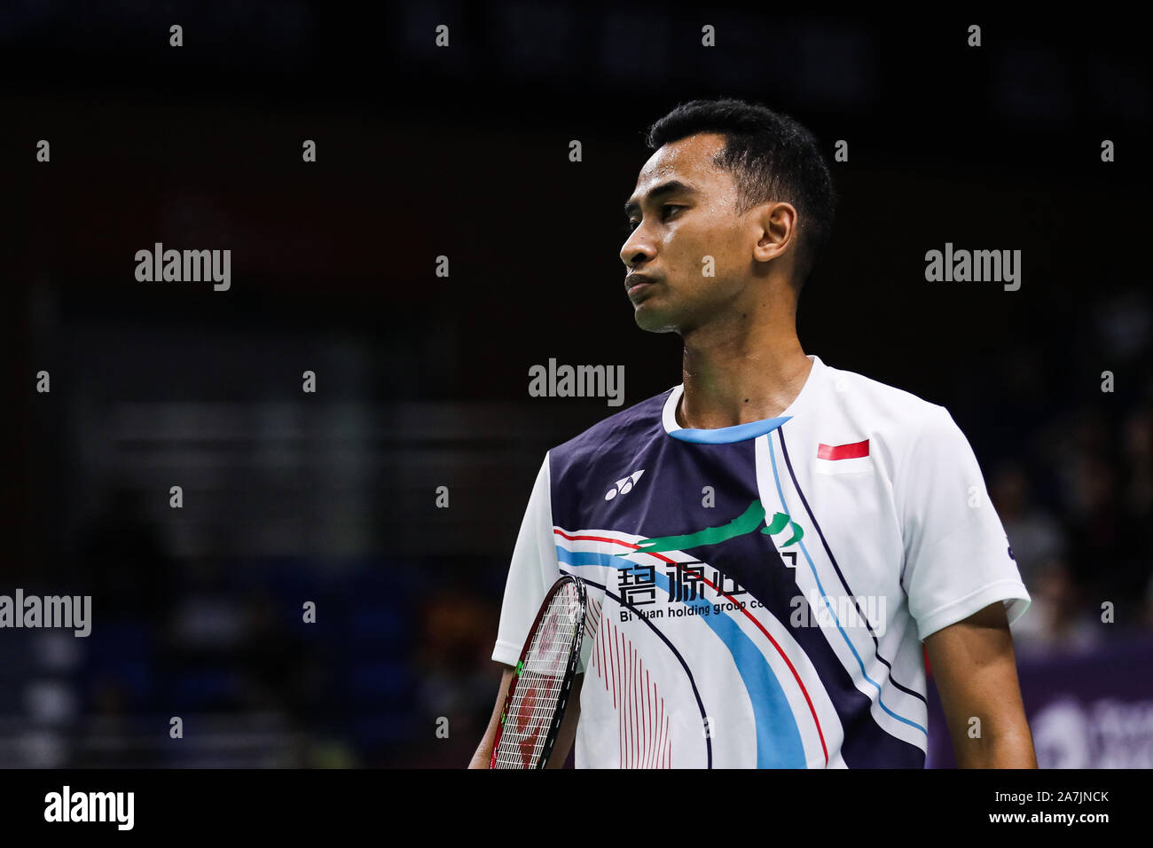 Indonesian professional badminton player Tommy Sugiarto competes ...