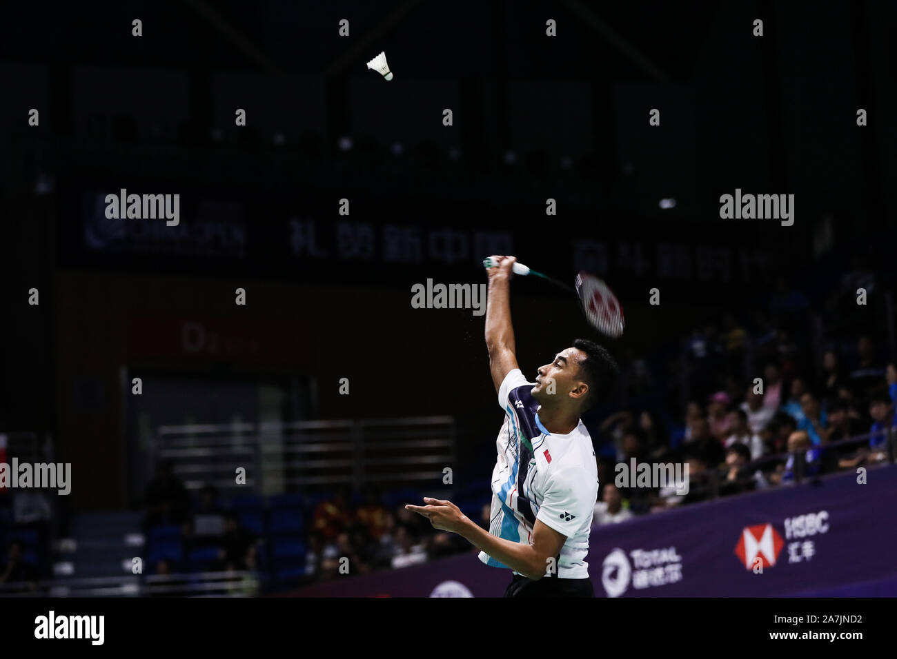 Indonesian professional badminton player Tommy Sugiarto competes ...