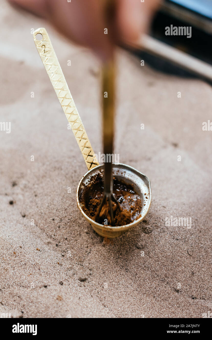 Making a traditional sketos/metrios/glikos/variglikos coffee in a ...