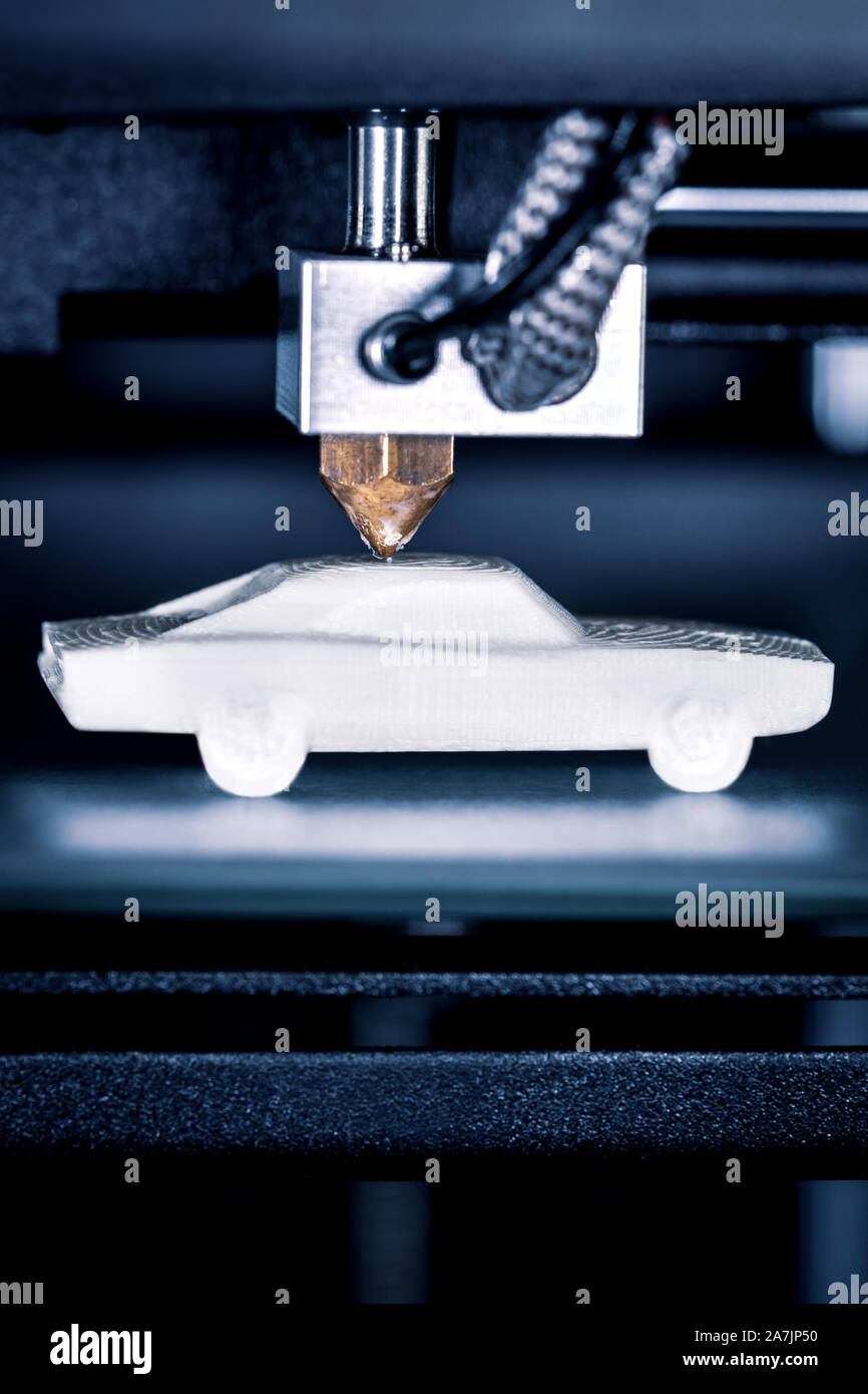 Car from the 3D printer, automobile is produced in the 3D printer with ...