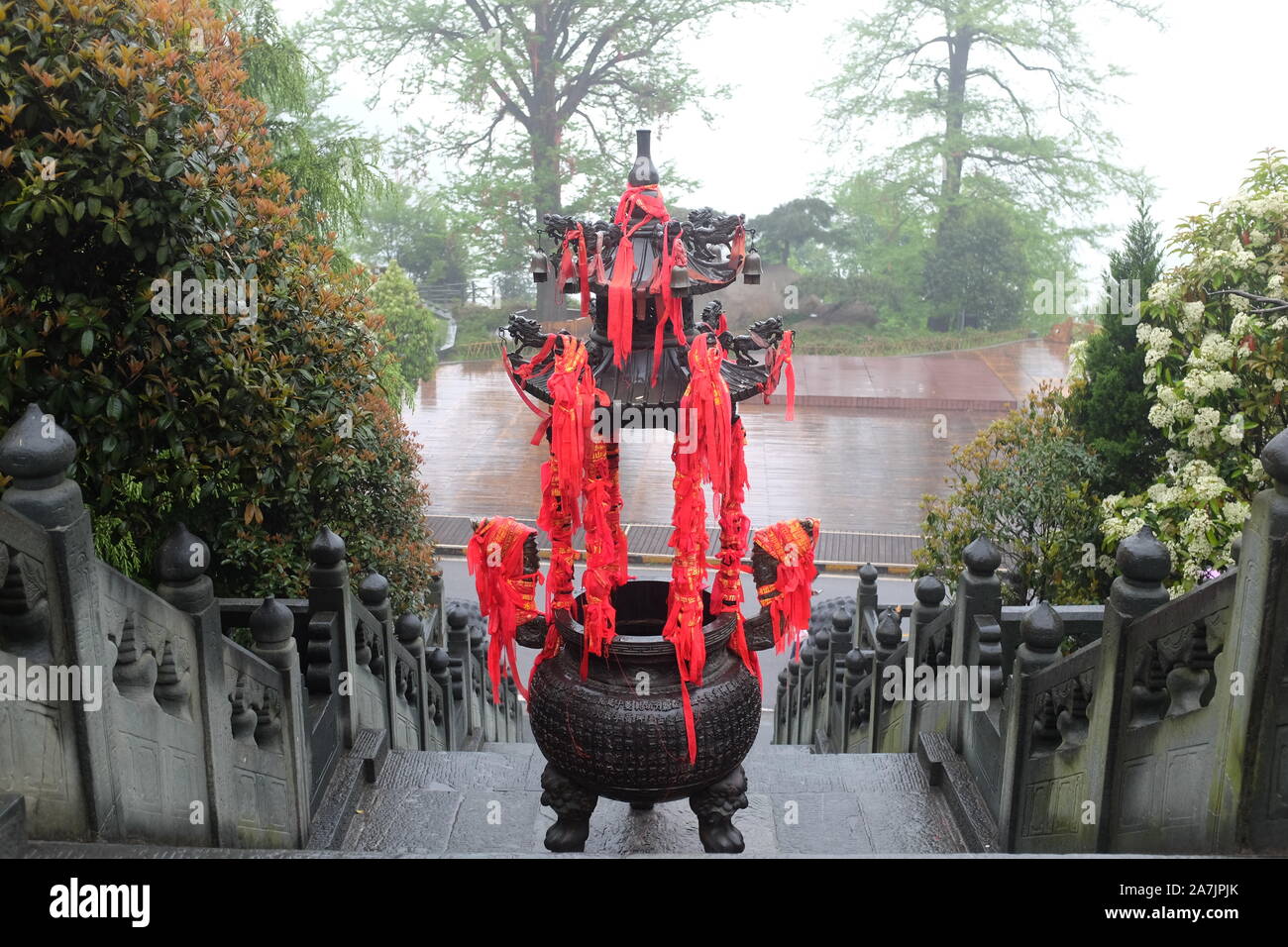 Memorable red ribbons during a rainy and foggy day in a wushu Temple ...