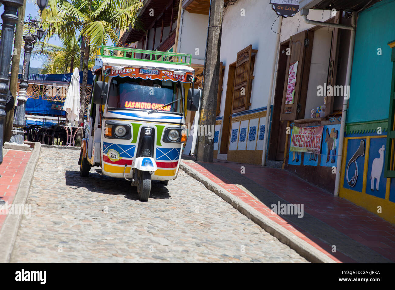 GUATAPE, COLOMBIA - SEPTEMBER 11, 2019: Colorful auto rickshaw on the ...