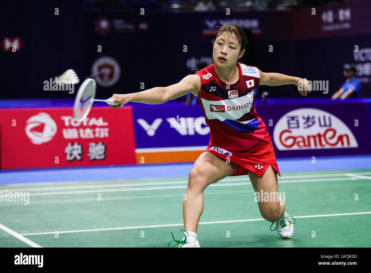 Japanese professional badminton player Nozomi Okuhara competes against ...
