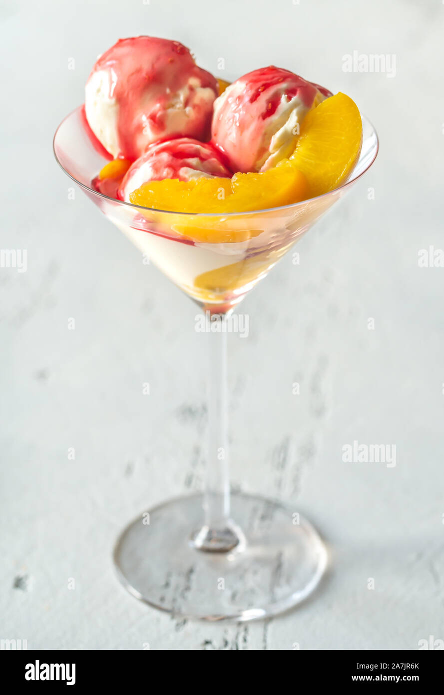 Peach Melba - dessert of peaches and raspberry sauce with vanilla ice ...