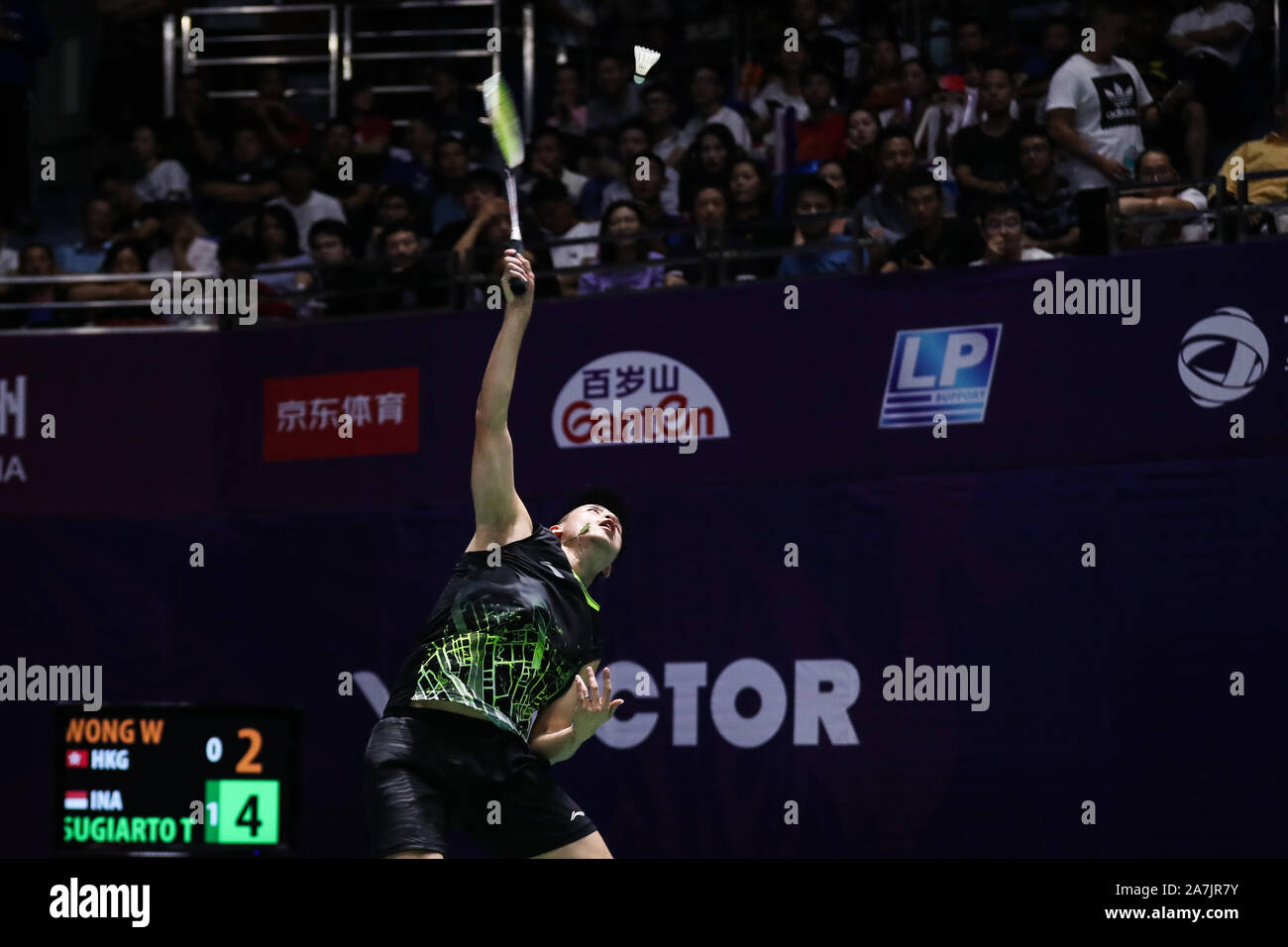 Indonesian professional badminton player Tommy Sugiarto competes ...
