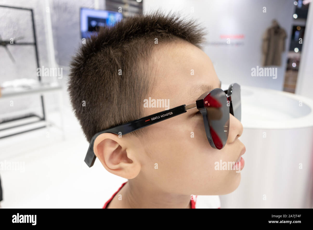 A child wears the Huawei x Gentle Monster smart glasses at a Huawei ...