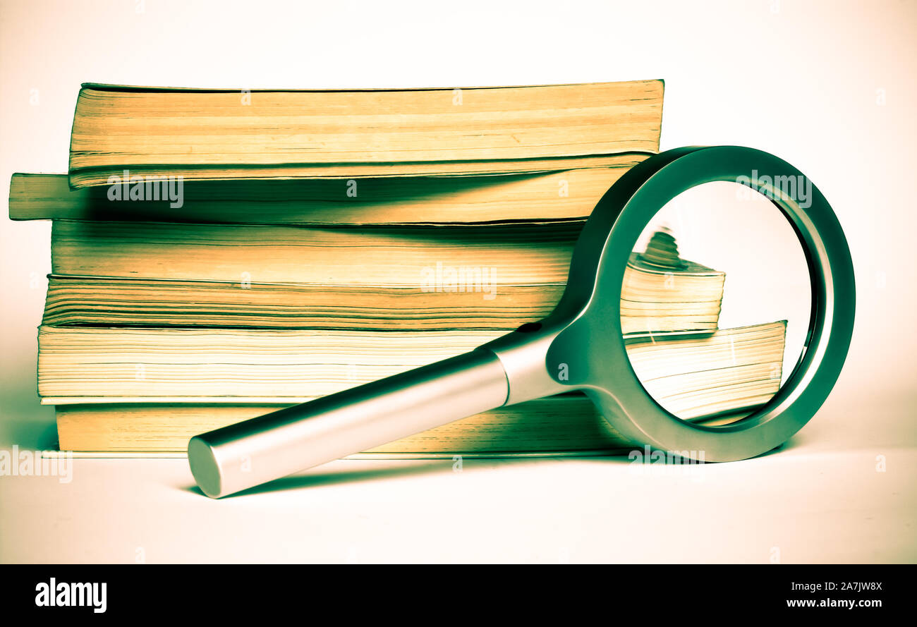 research in old antique books Stock Photo - Alamy