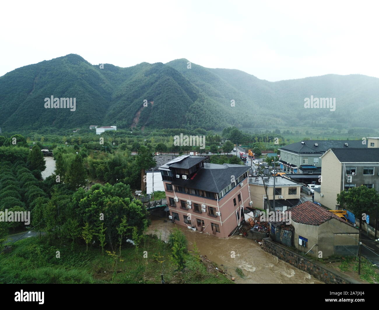 A house's first floor sinks into water due to heavy rainstorm caused by ...