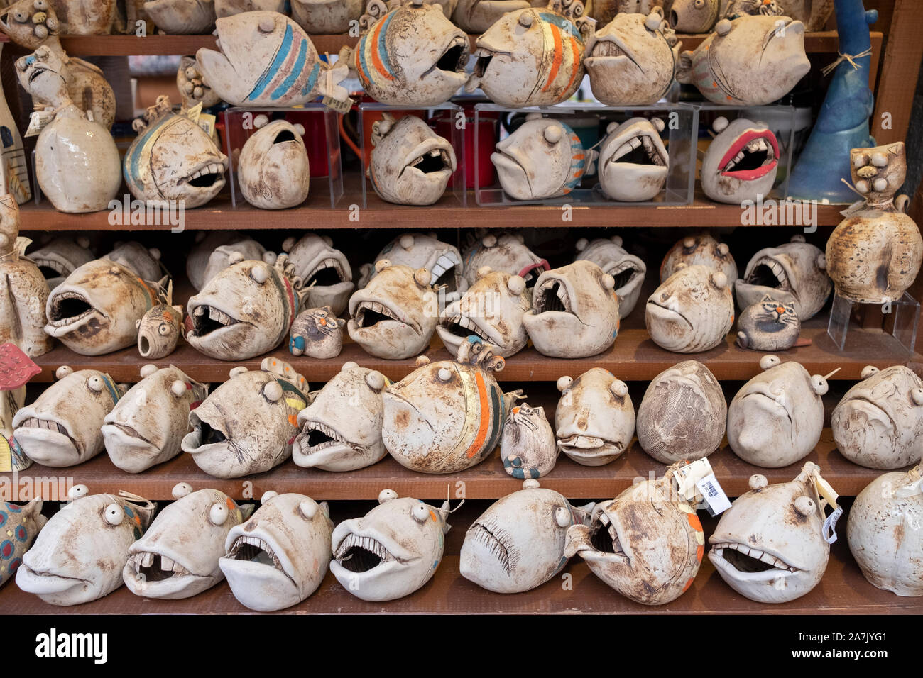 Ugly Turkish ceramic fish for sale at a tourist gift shop in the Old ...