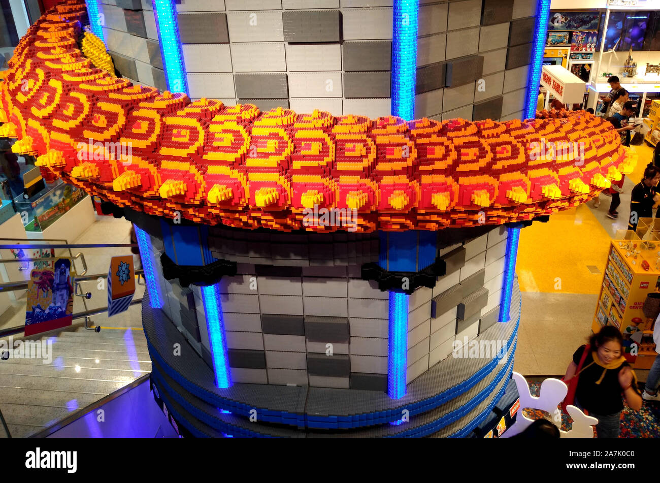 Consumers stroll and observe new LEGO models exhibited as the first ...