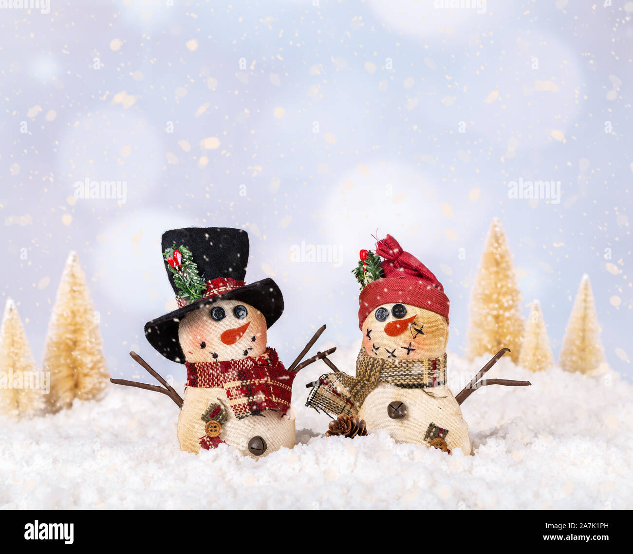 Falling snow on snowman hi-res stock photography and images - Alamy