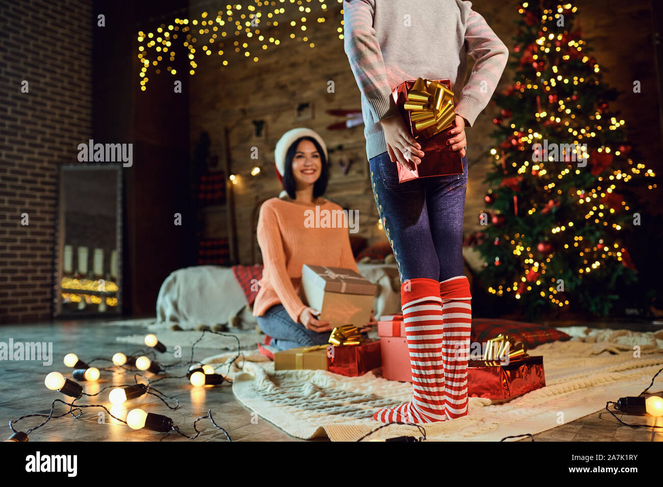 Behind present hi-res stock photography and images - Alamy