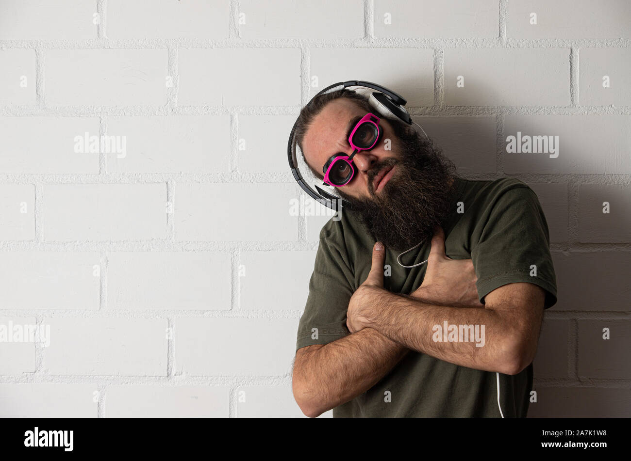 young man with goggles and headphone Stock Photo - Alamy