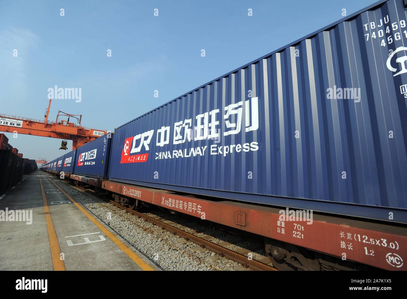 A container train of China Railway Express leaves a railway station for ...