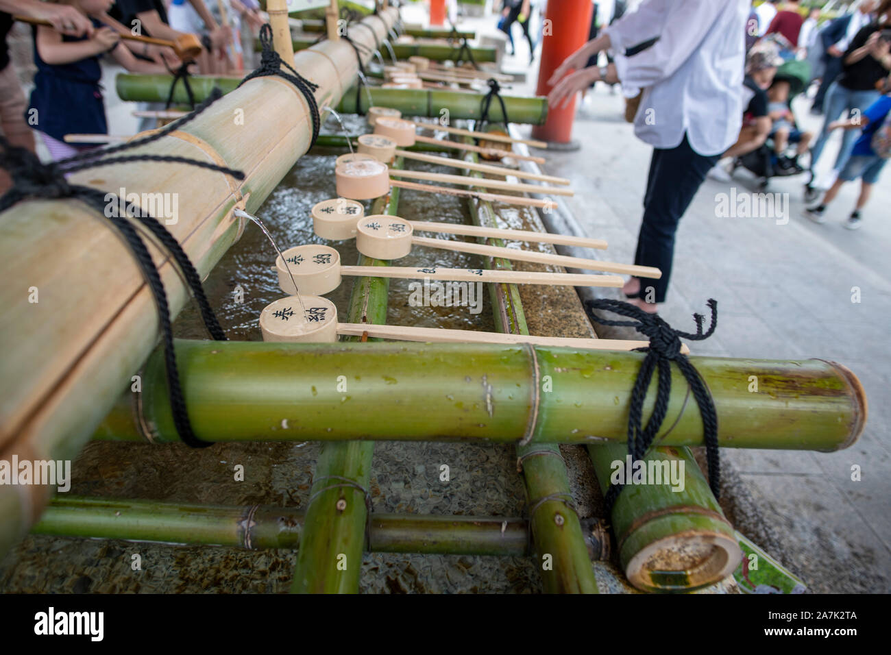 The purification ritual at Fushimi Inari Shrine, Japan Stock Photo - Alamy