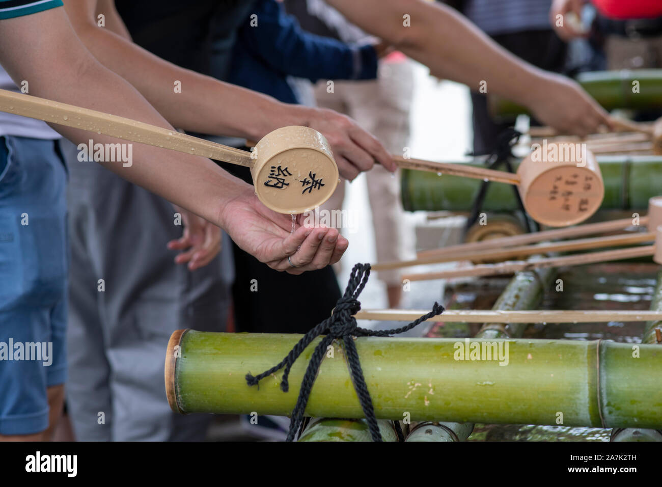 The purification ritual at Fushimi Inari Shrine, Japan Stock Photo - Alamy