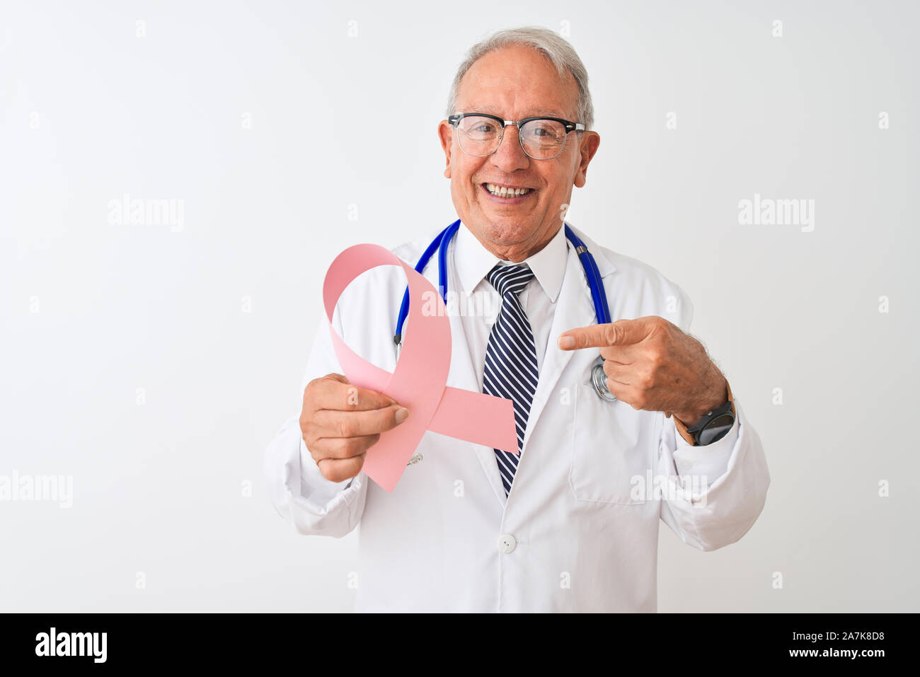 Senior grey-haired doctor man holding cancer ribbon over isolated white ...
