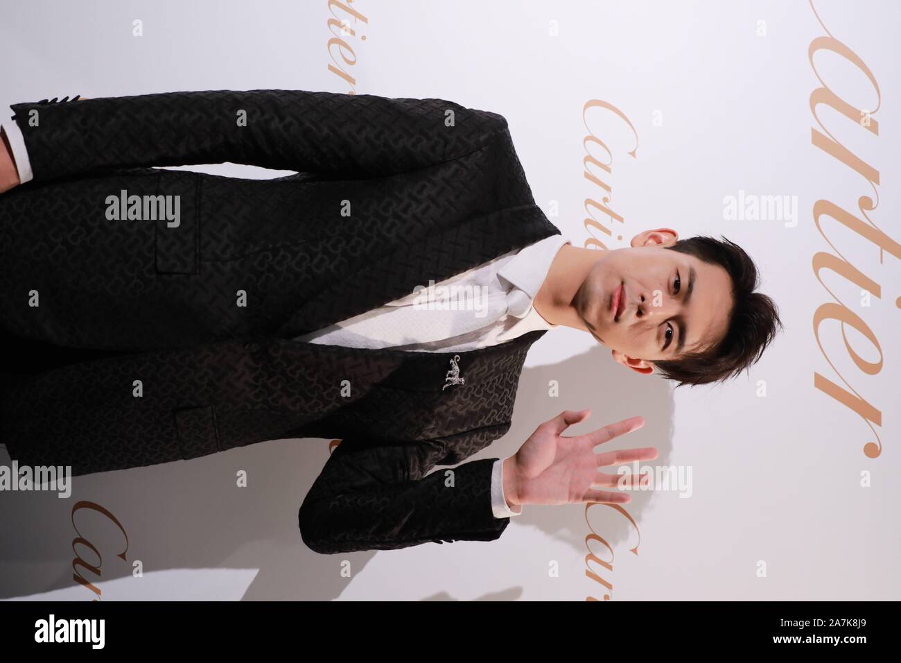 Chinese actor Li Xian suits up at 2019 Cartier Magnitude High-end ...